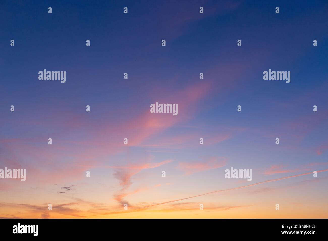Sunset sky background. Blue sky with colorful clouds Stock Photo - Alamy