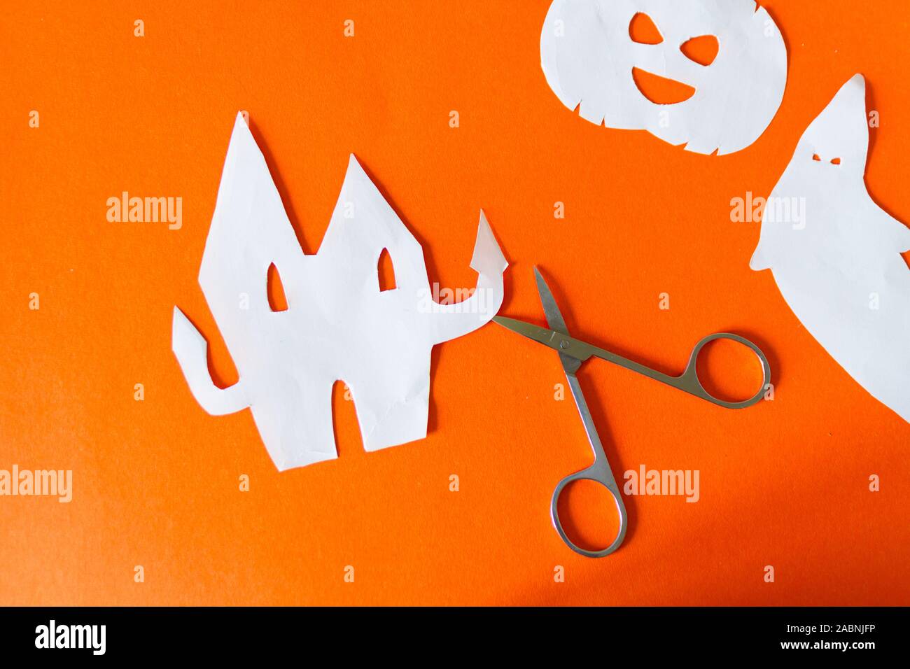 Making halloween decoration concept. Paper and scissors Stock Photo - Alamy