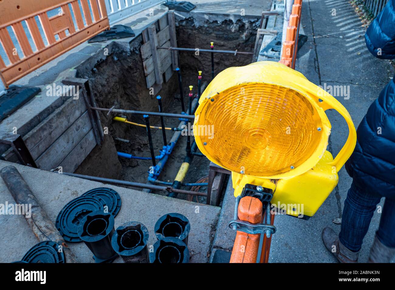 Building site with construction light in orange Stock Photo - Alamy