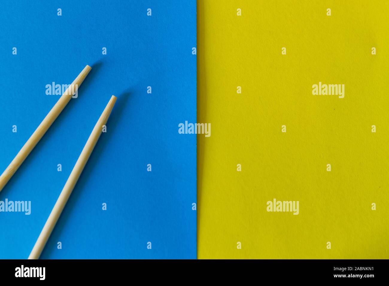 Traditional chinese food sticks on yellow and blue background Stock ...