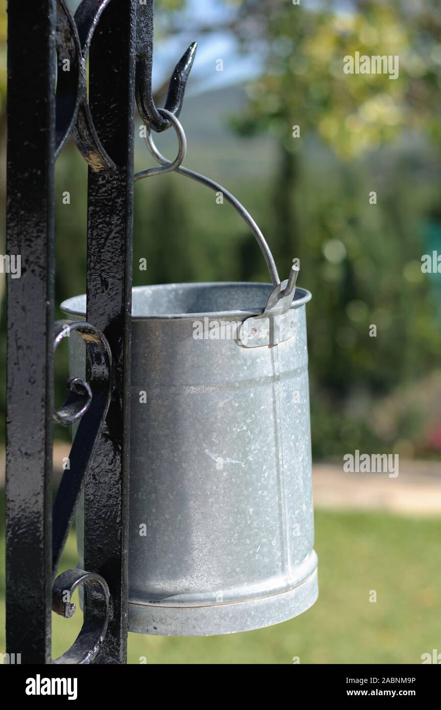 bucket for a set of water from the well Stock Photo - Alamy