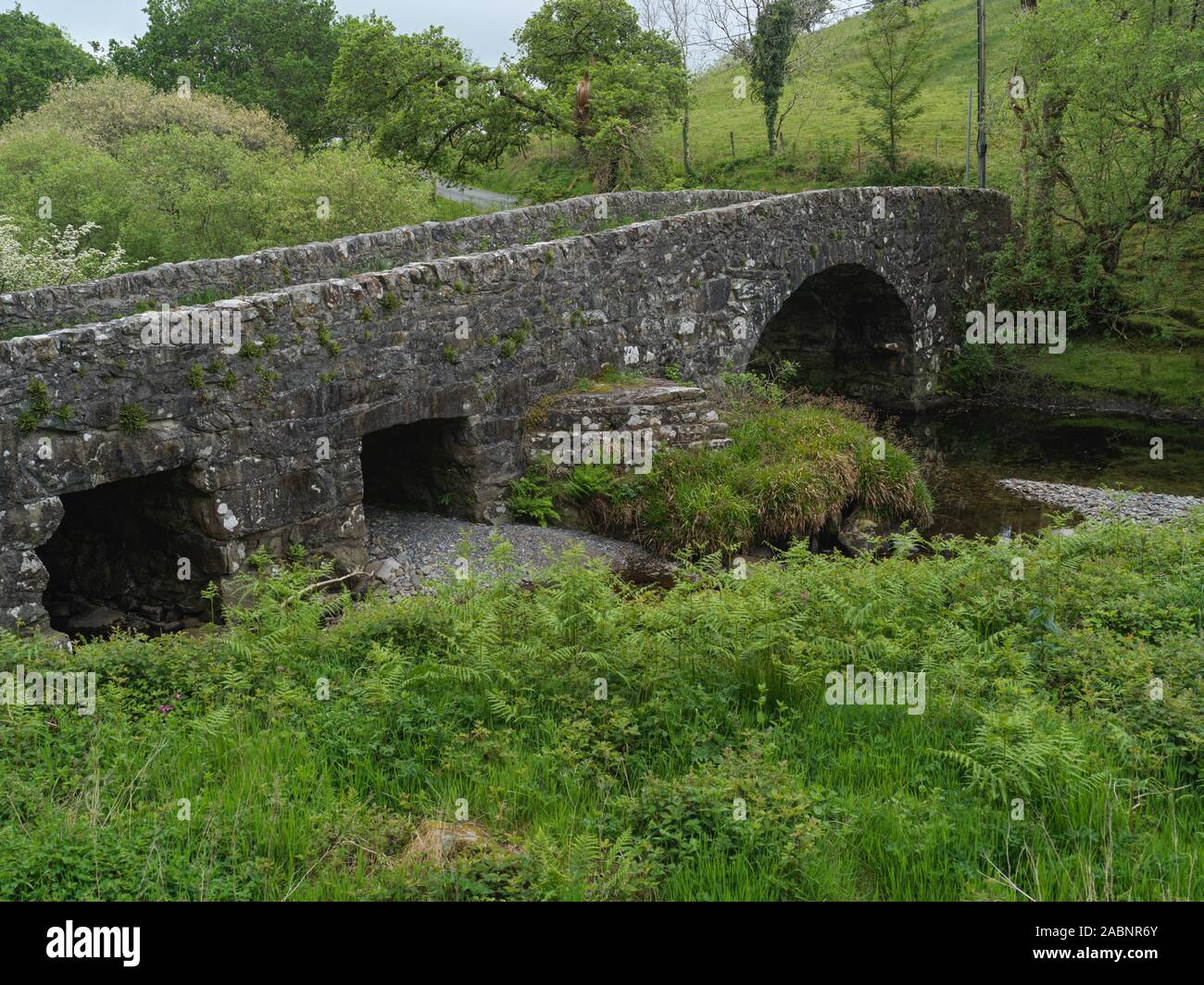 Stone bridge over the Afon Dwyfor at Llanfihangel-y-Pennant Stock Photo ...