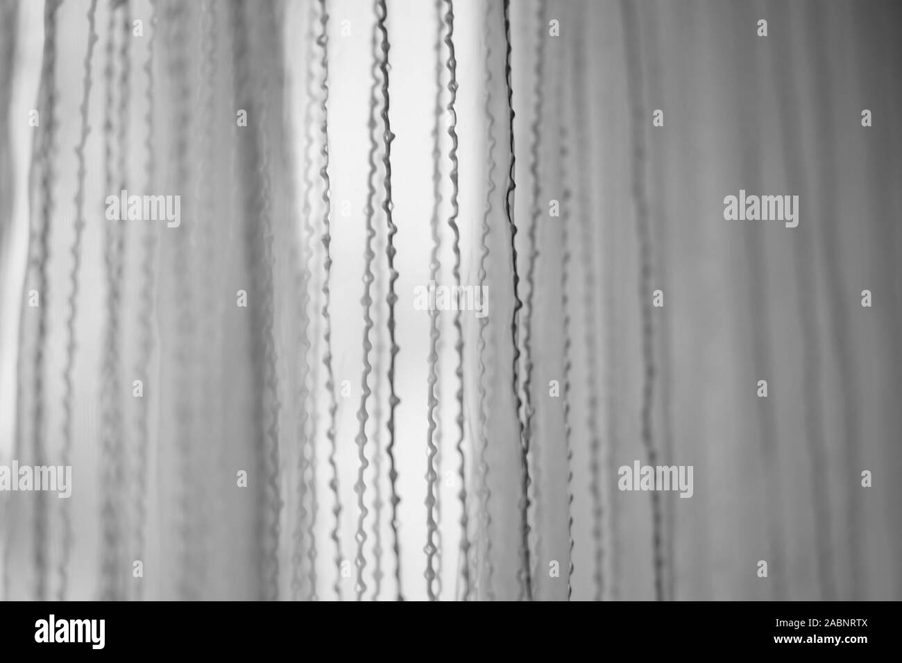 Vertical glass threads hi-res stock photography and images - Alamy
