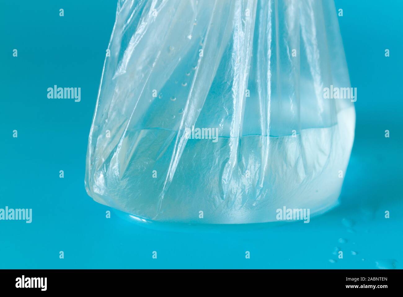 Water in plastic bag. Ocean pollution concept Stock Photo - Alamy