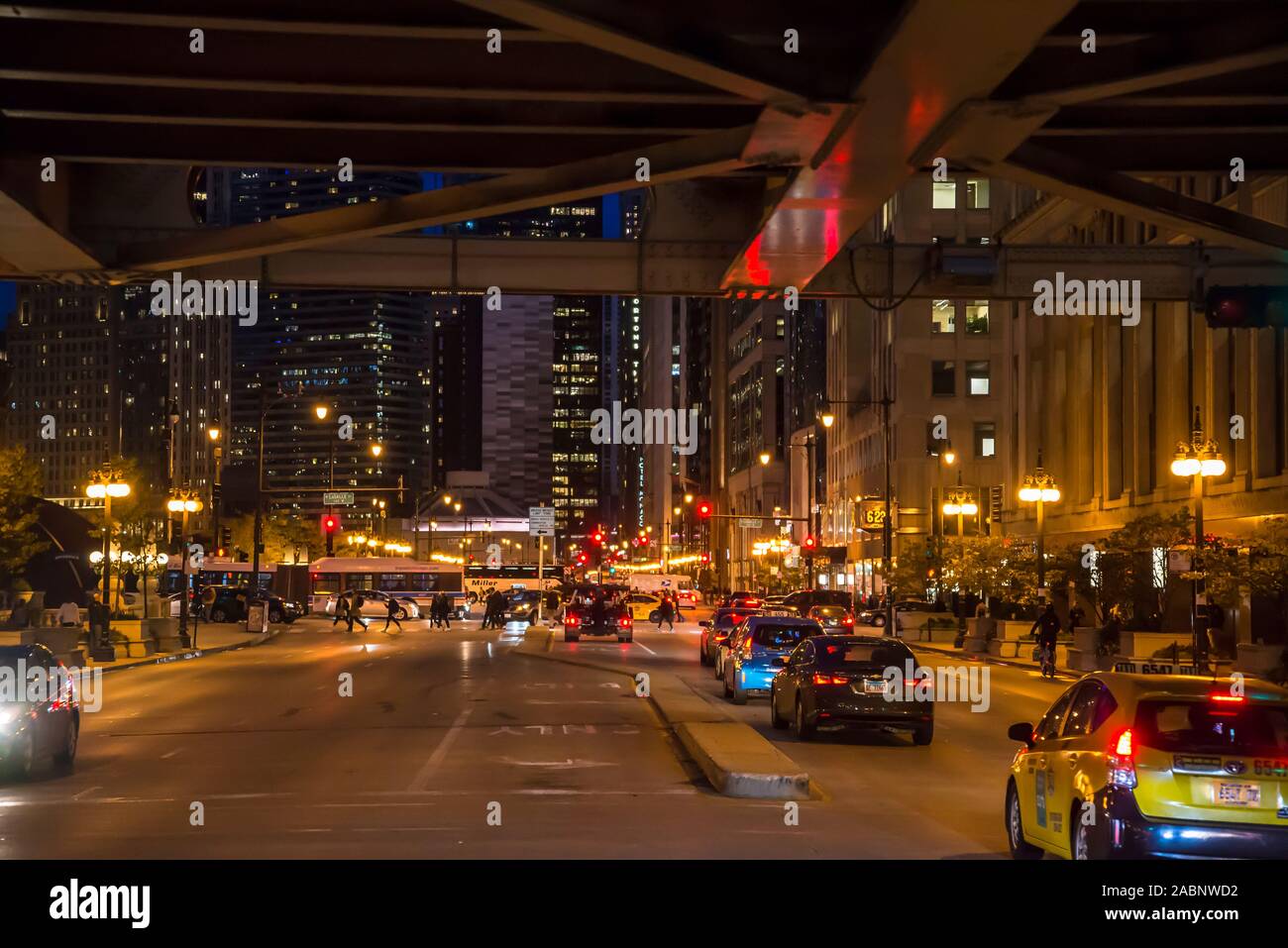Road - West Wacker Drive under L-railway bridge in downtown Chicago ...