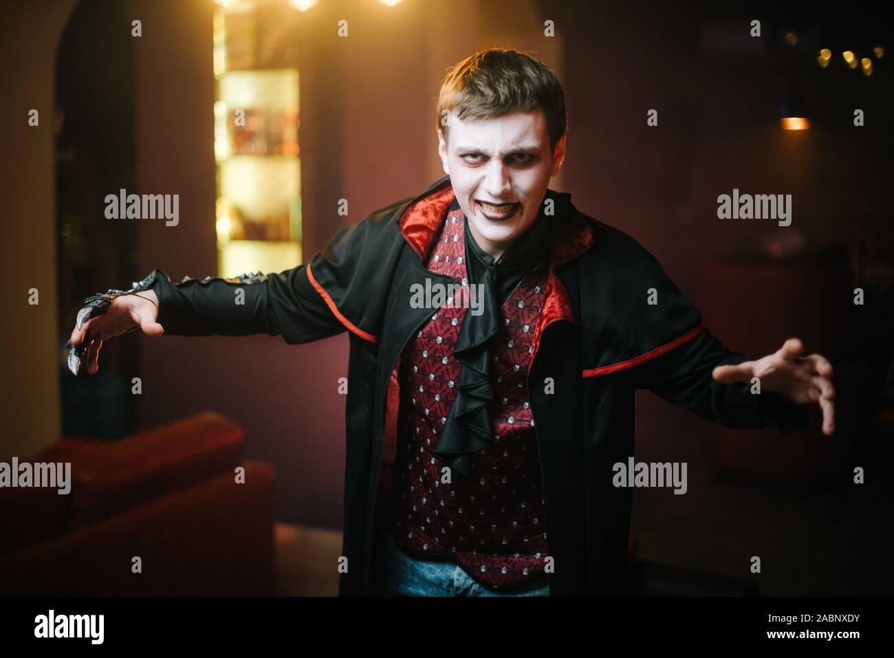 The young man in the Halloween costume of Count Dracula Stock Photo - Alamy