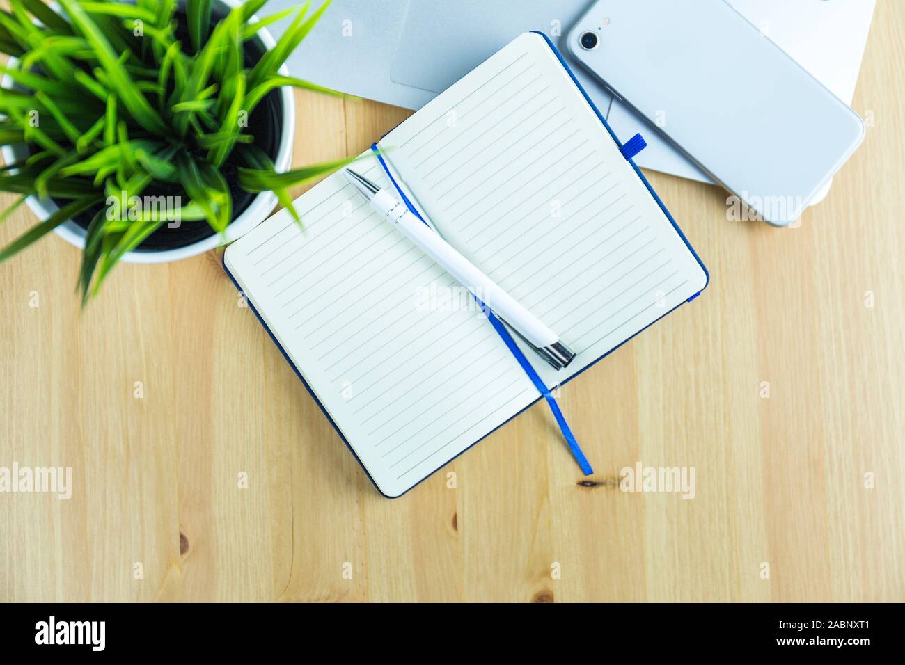 notebook on the desk with a computer and a telephone, top view Stock ...