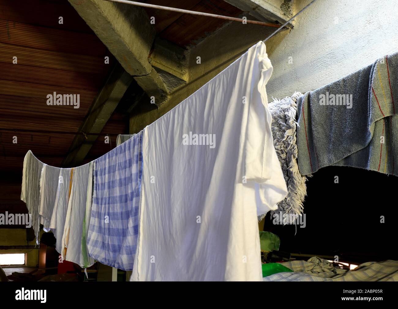 Clothes in tatters hi-res stock photography and images - Alamy