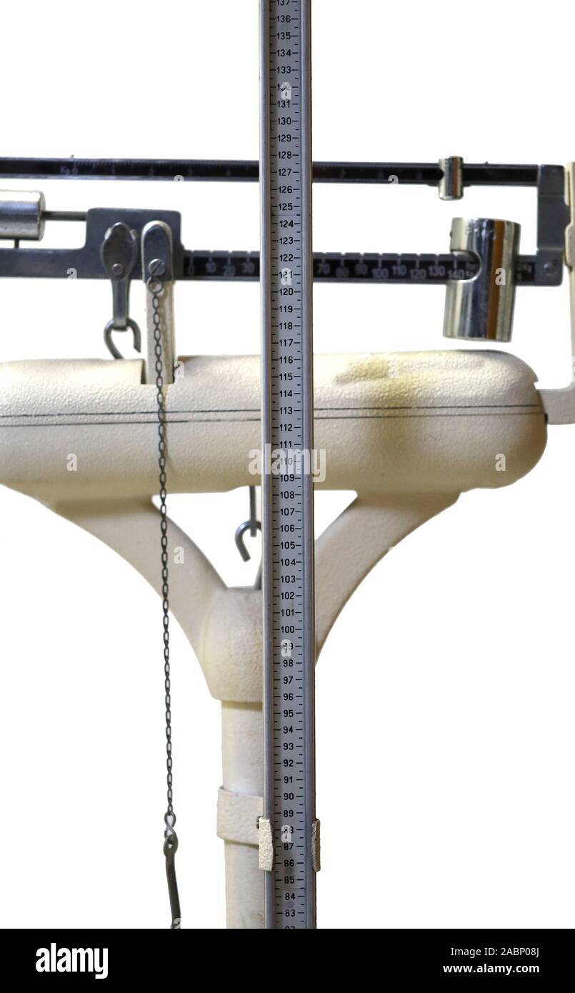 vintage scale to weigh and hte graduated rod to measure children during ...