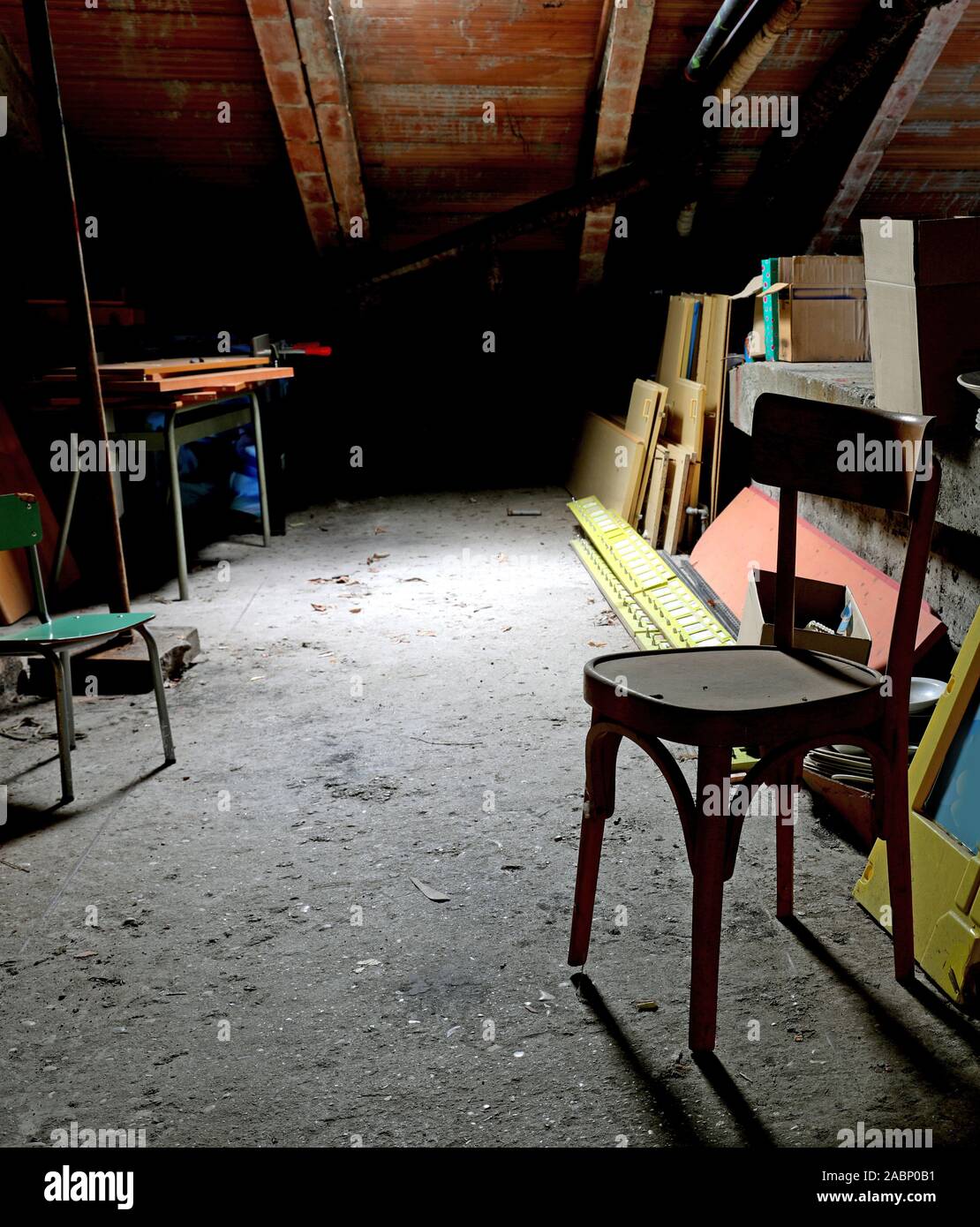 very dust and dirty attic with many abandoned items Stock Photo - Alamy