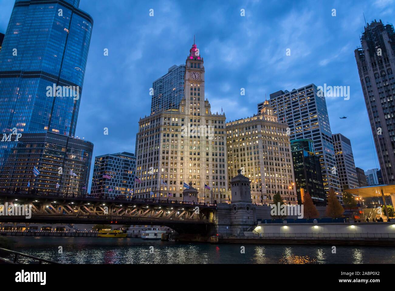 The Wrigley Building, a 1924 landmark skyscraper and clocktower, and DuSable Bridge, Chicago ...