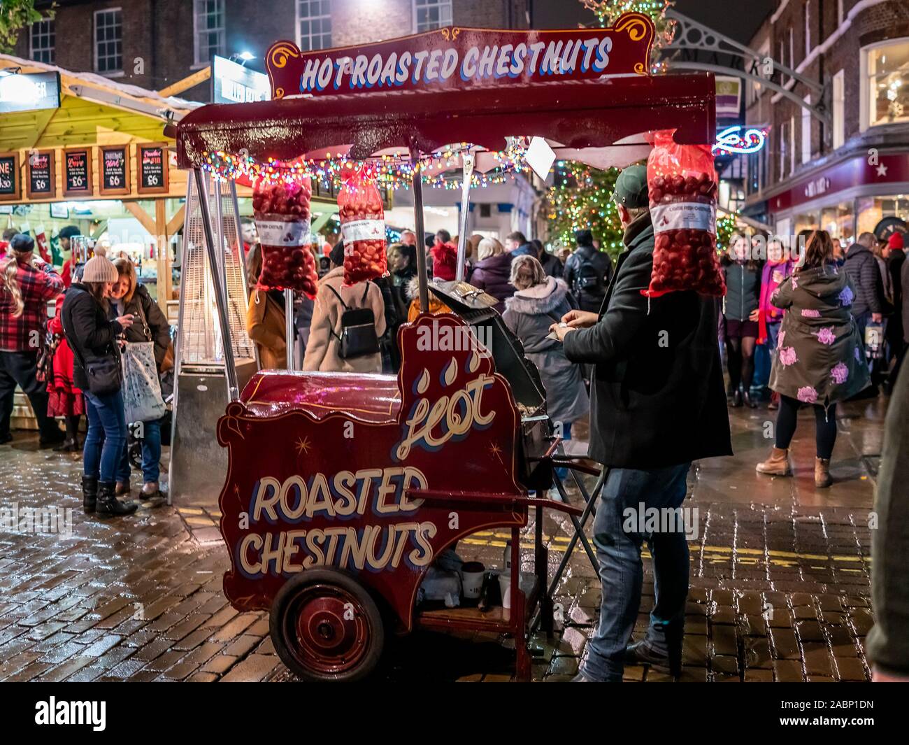 Street vendor selling chestnuts at christmas hi-res stock photography ...