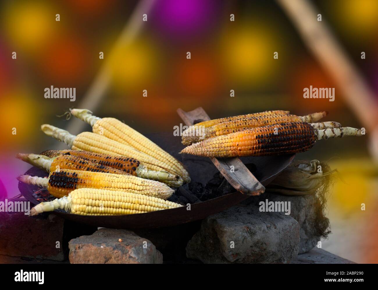 Roasted corn in street stall Stock Photo - Alamy