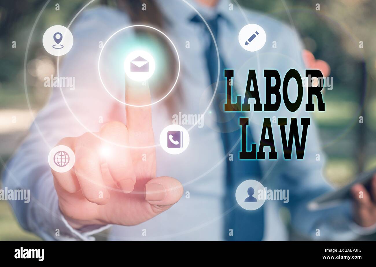 Writing note showing Labor Law. Business concept for rules relating to ...