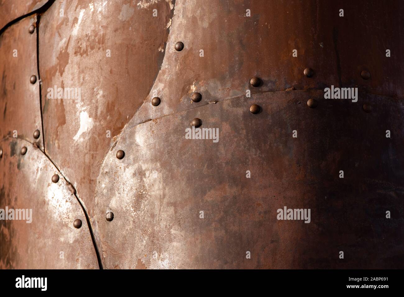 Rusted steel plates joined with rivets Stock Photo - Alamy