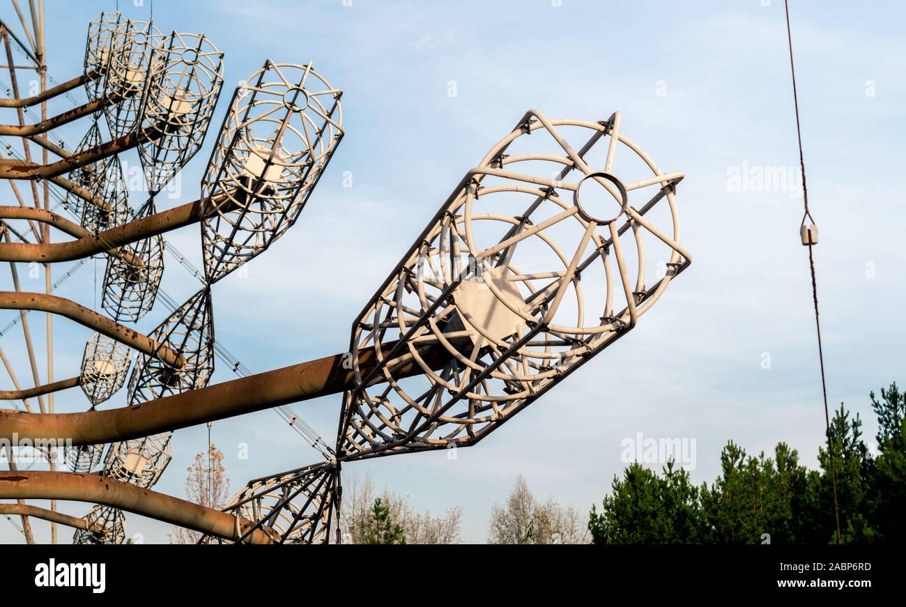 old secret army soviet radar on a background of blue sky and clouds in ...