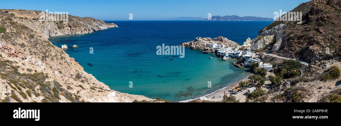 Panorama of Firopotamos beach with church, houses and cliffs, Milos ...