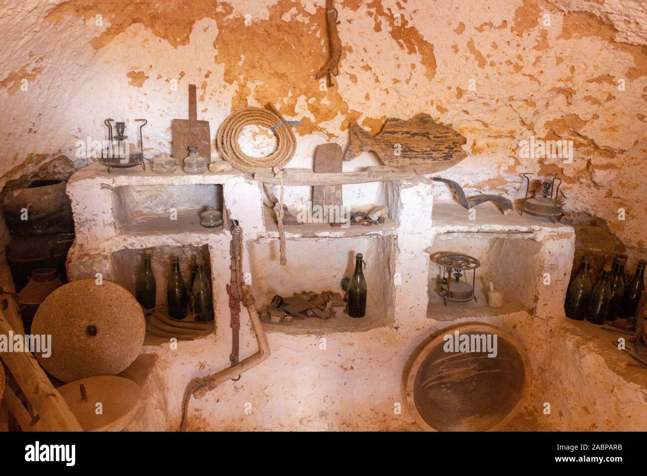 Utility room in a traditional cave house in the desert of Tunisia Stock ...