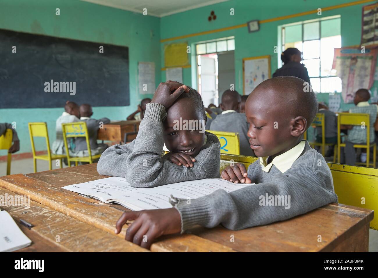 Schoolgirl and schoolgirl in the classroom during lessons at the ...