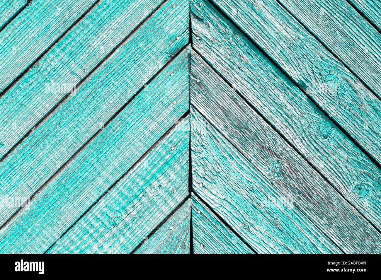 Aged painted cracked boards with turquoise color peeling. Old natural ...
