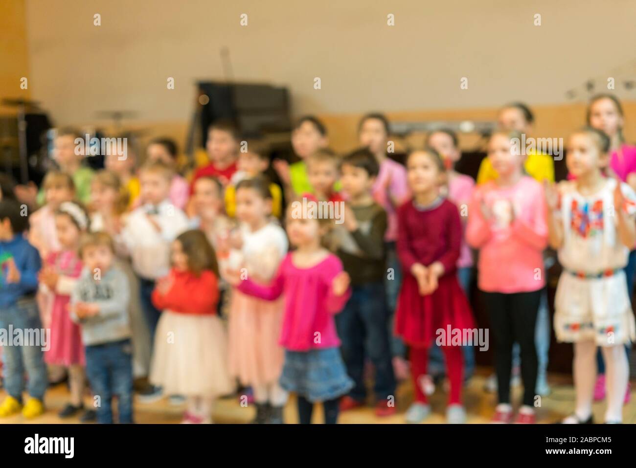A large group of primary school children. Blurry Stock Photo - Alamy
