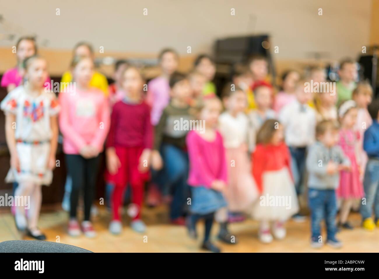 A large group of primary school children. Blurry Stock Photo - Alamy