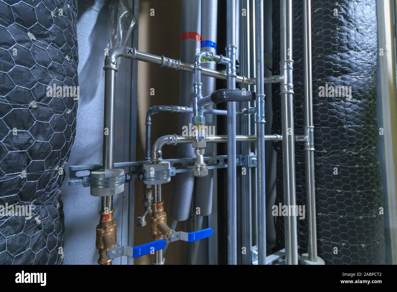 Install water pipes and sewage to the apartment Stock Photo - Alamy