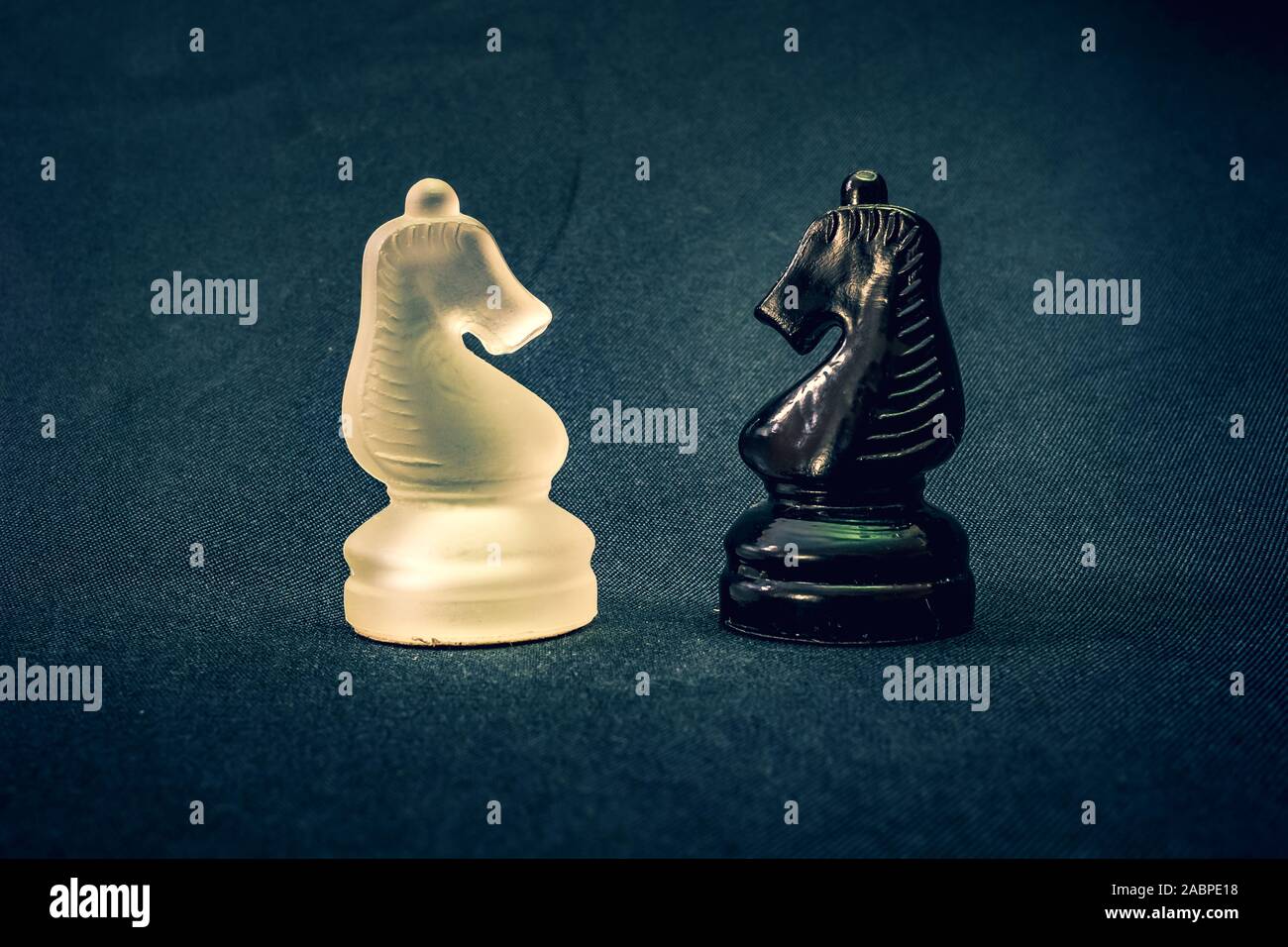 Opposing Knights face there differences face to face Stock Photo - Alamy