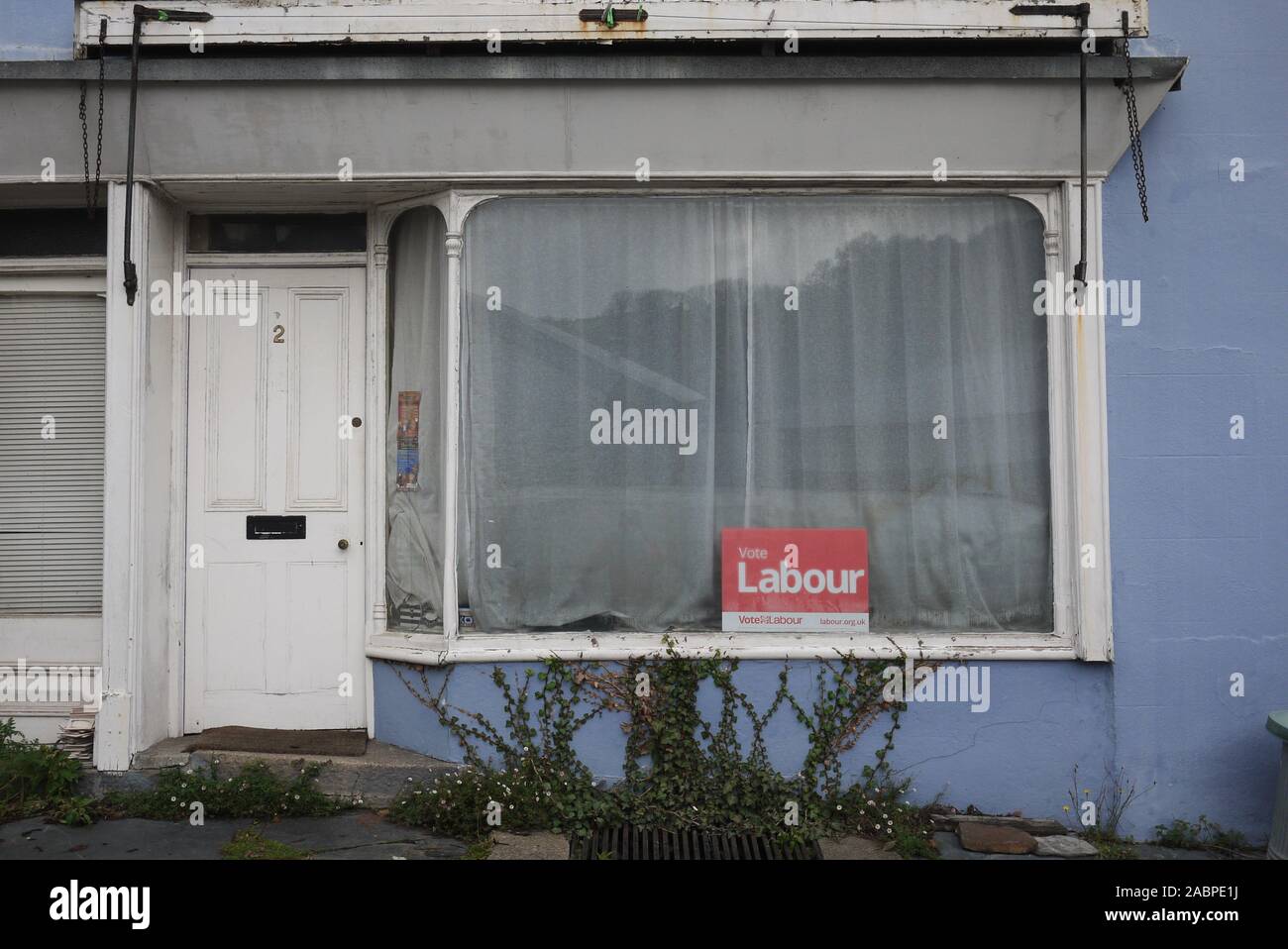 Vote Labour poster in an old shop window, Calstock, Cornwall, England ...