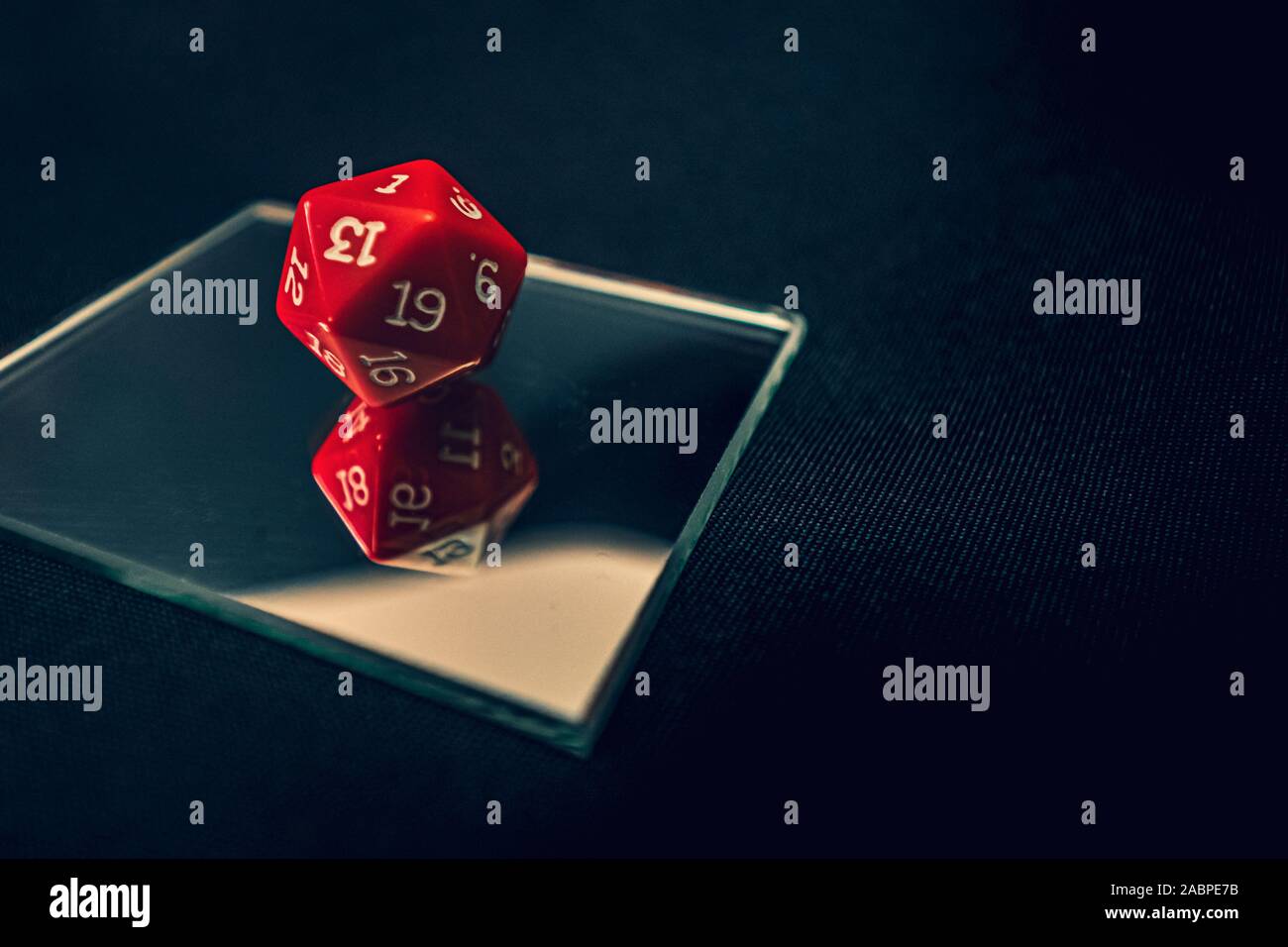 new 20 sided die with 1 faceing straight up Stock Photo - Alamy
