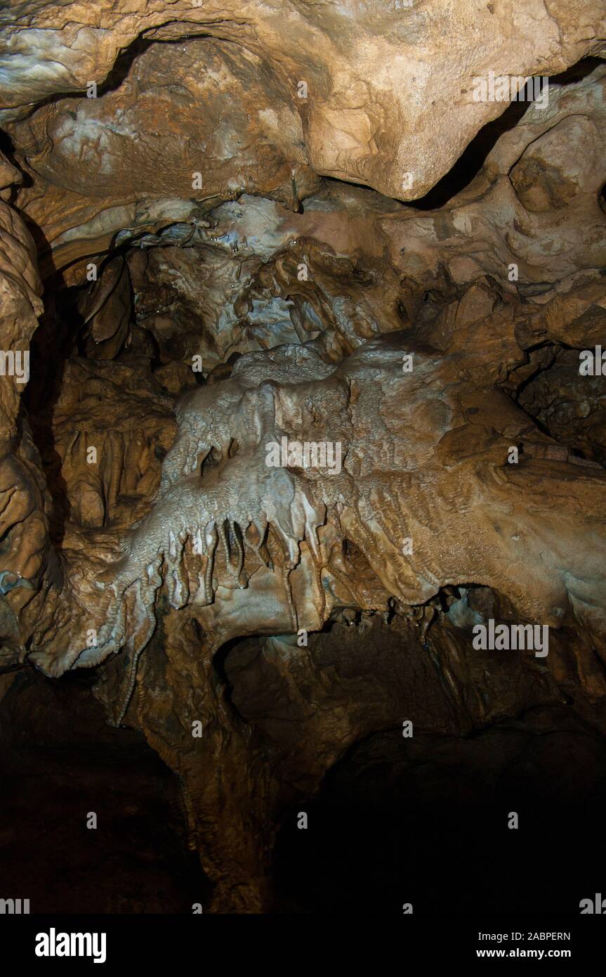 Cave wall with rock formations and stalactites Stock Photo - Alamy