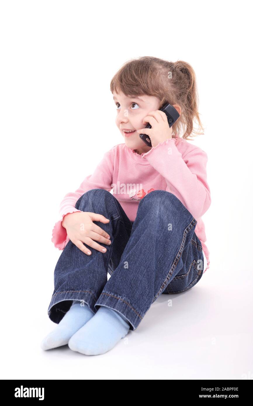 Kind beim telefonieren Stock Photo - Alamy