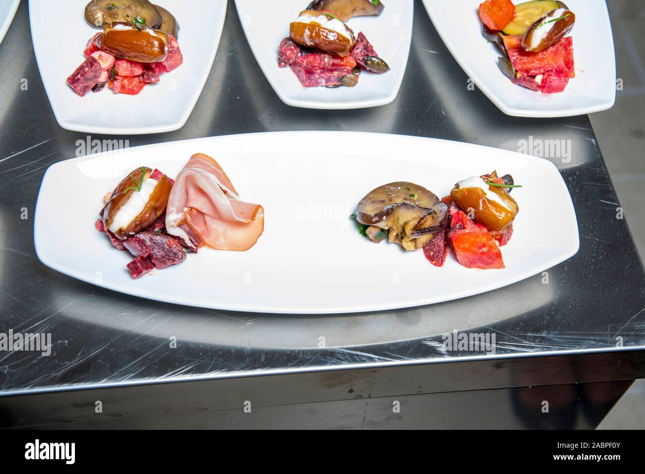 starter plate with ham and vegetables Stock Photo - Alamy