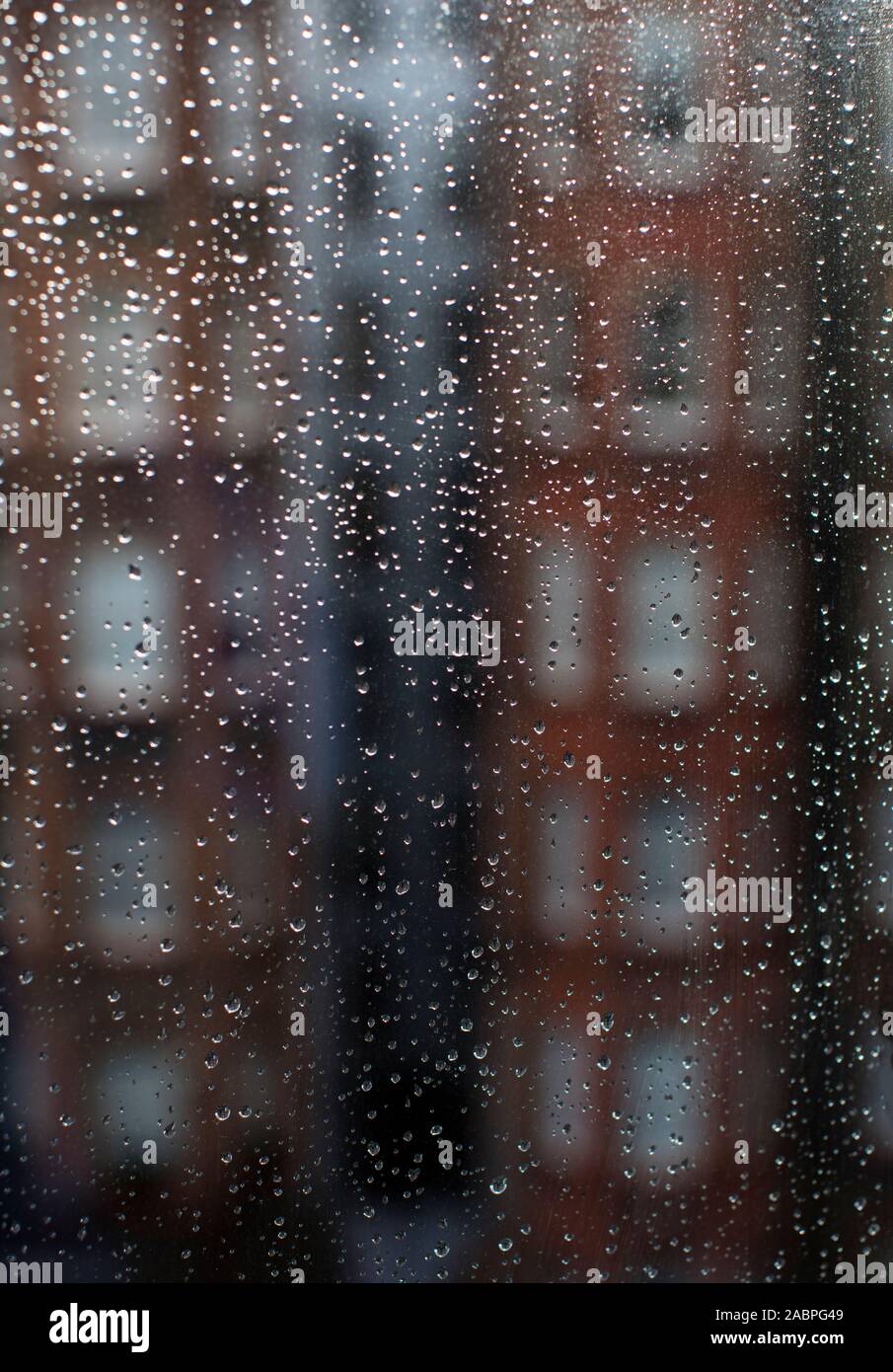 Rain on windowpane, Kensington, London, UK Stock Photo - Alamy