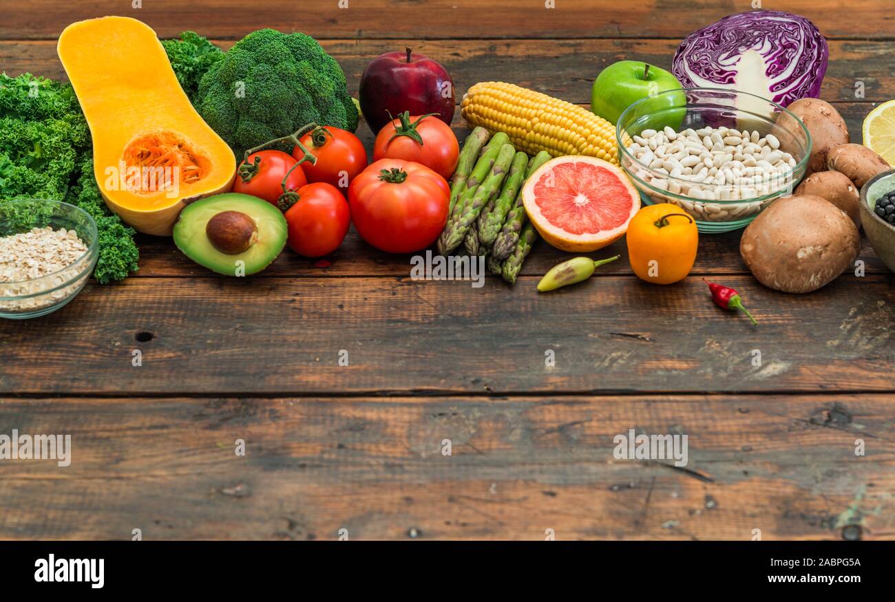 Fresh organic fruit and vegetables, white beans, oatmeal, and ...