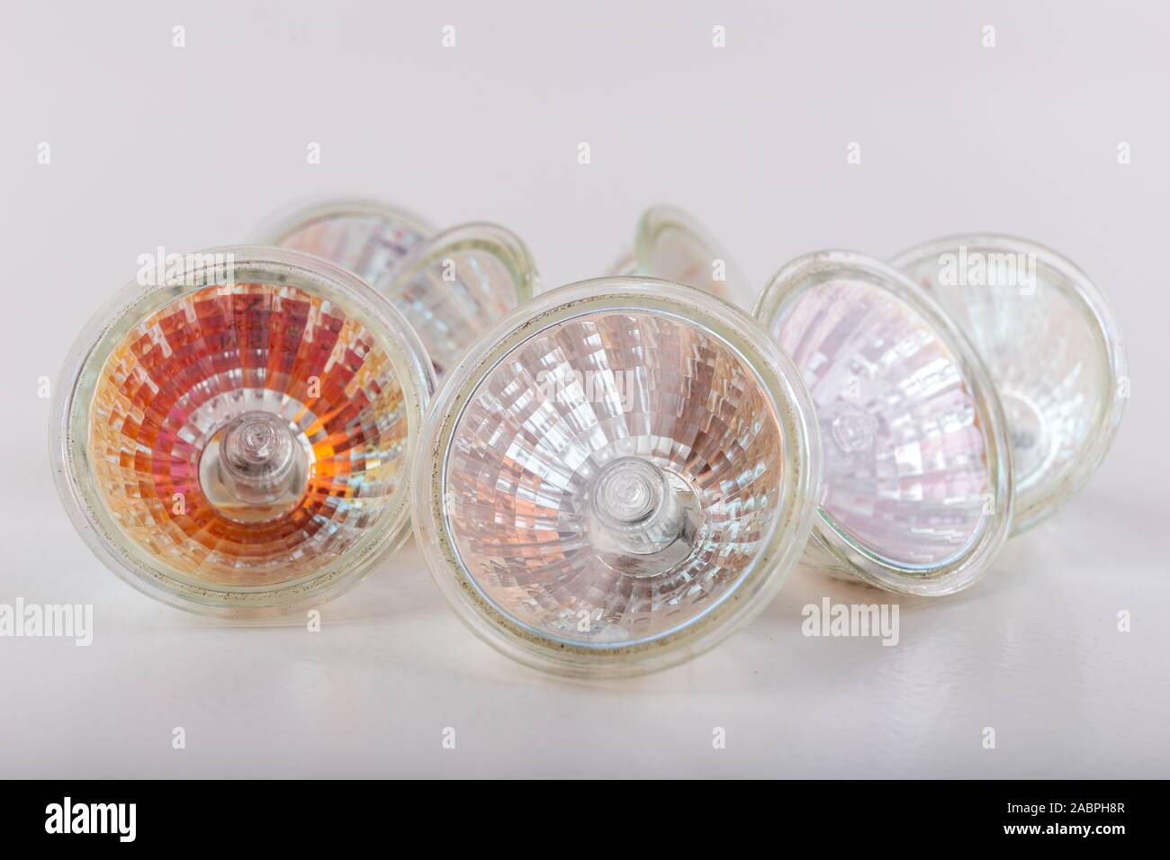 Old halogen bulb. Household electrical accessories. Bright background ...