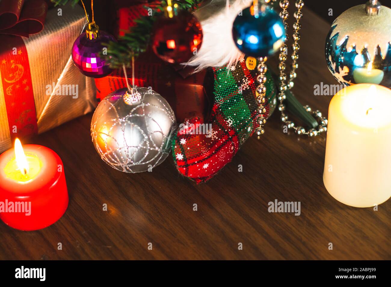 Christmas decorations and ornaments under a Christmas tree around the ...