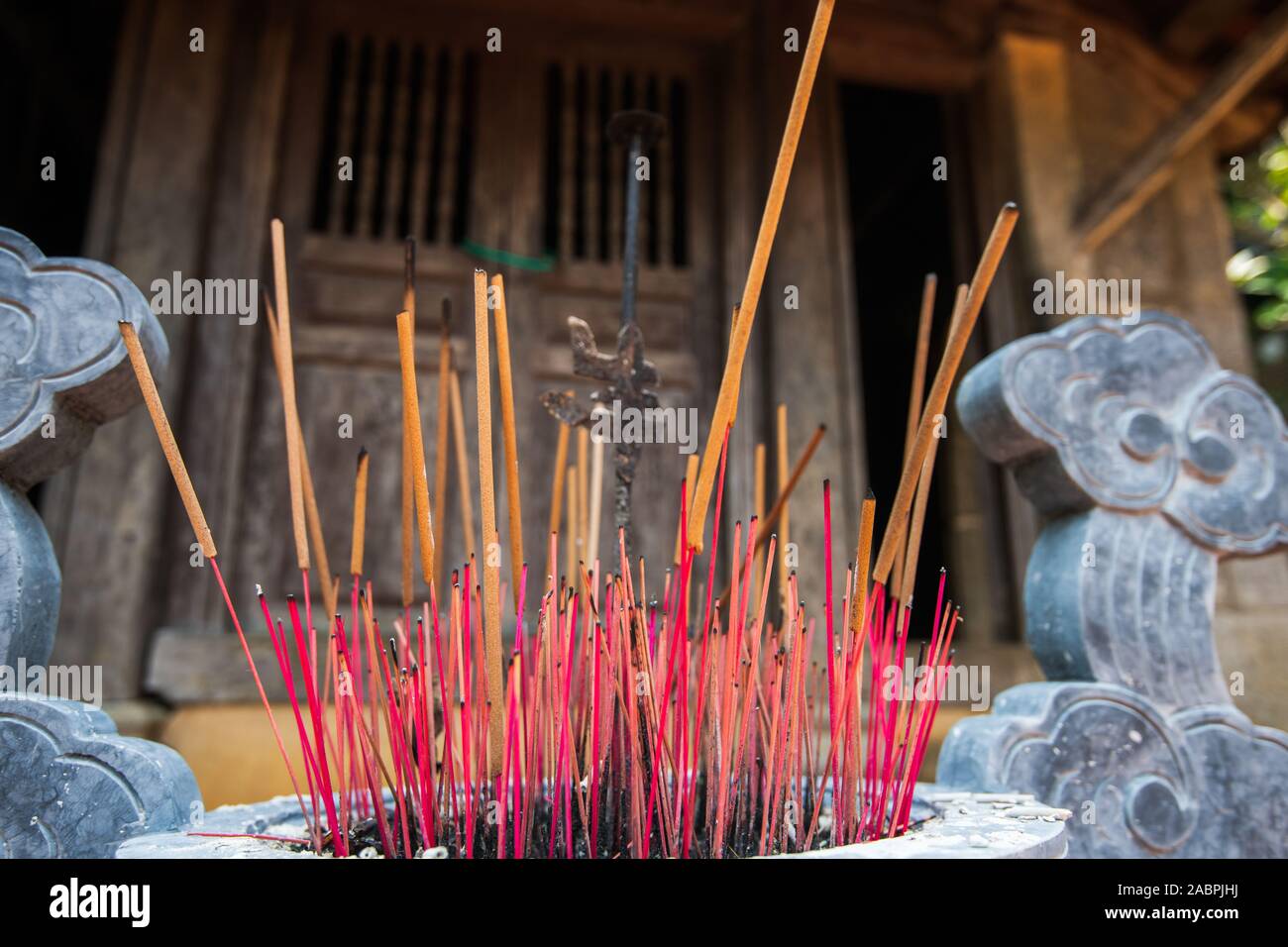 Red prayer sticks hi-res stock photography and images - Alamy