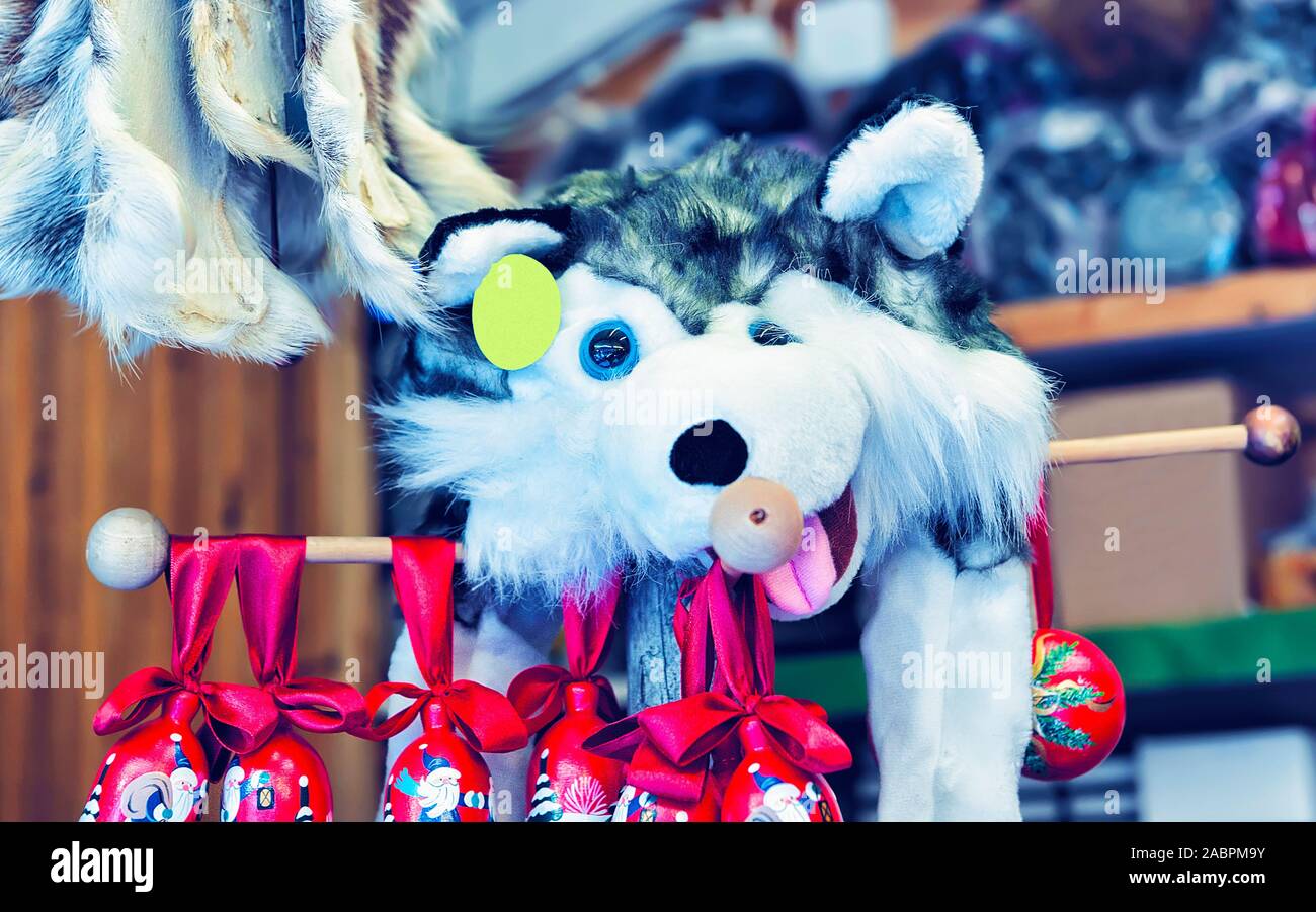 Market stall with husky dog toy in winter Rovaniemi reflex Stock Photo ...