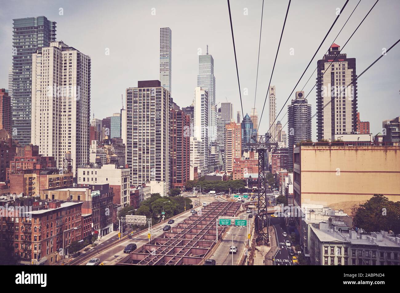 Retro toned picture of Manhattan skyline seen from the cable car, New ...