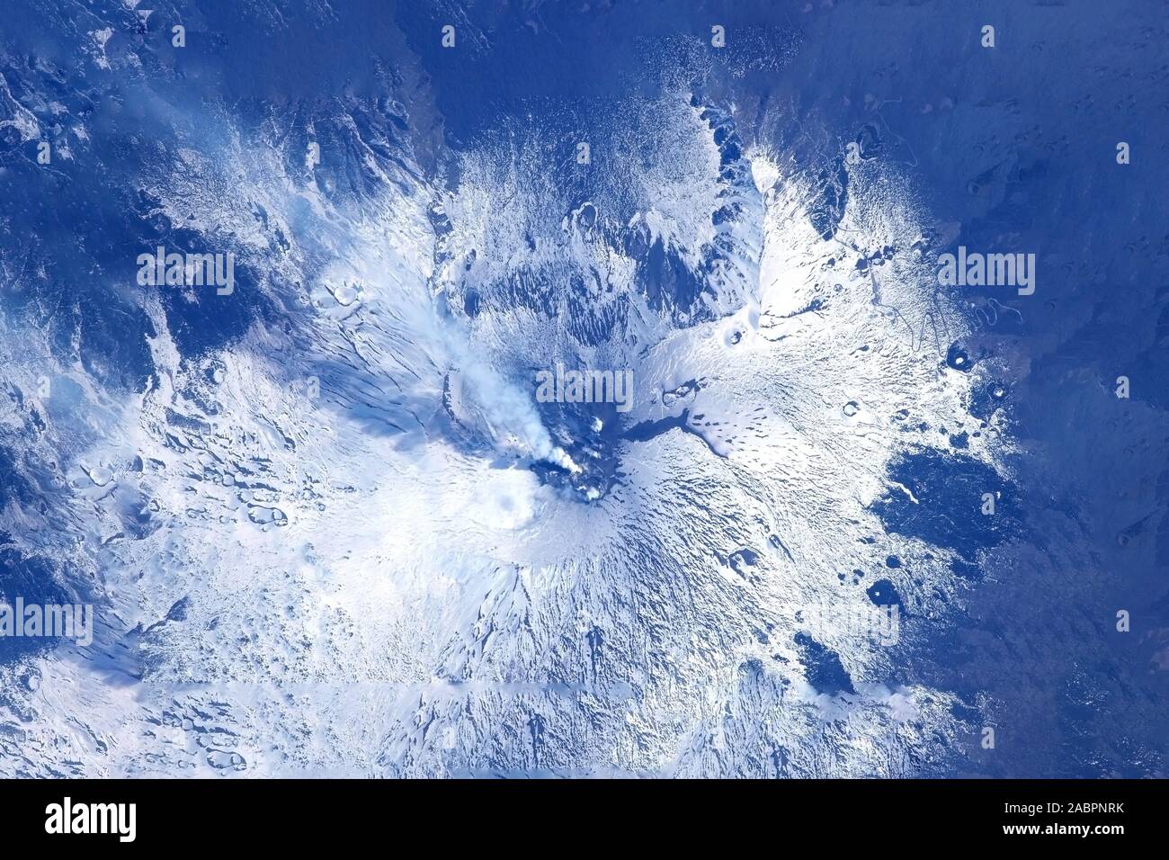 Volcano erupts, view from space. Elements of this image were furnished ...