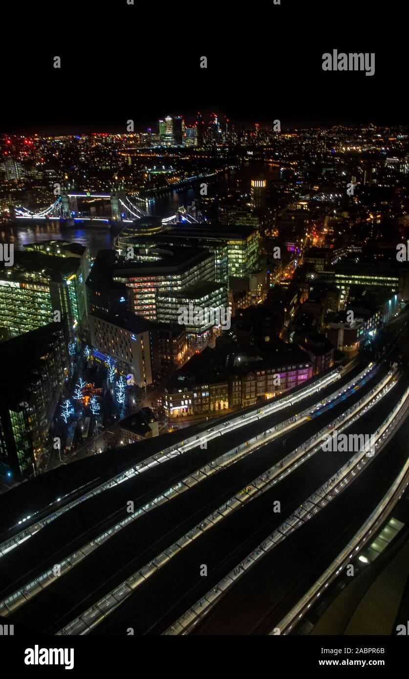 London Bridge Station, Tower Bridge and the Docklands at night Stock ...