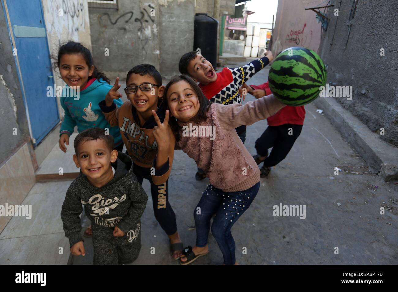 Palestinian children play in the street in Khan Younis refugee camp in ...