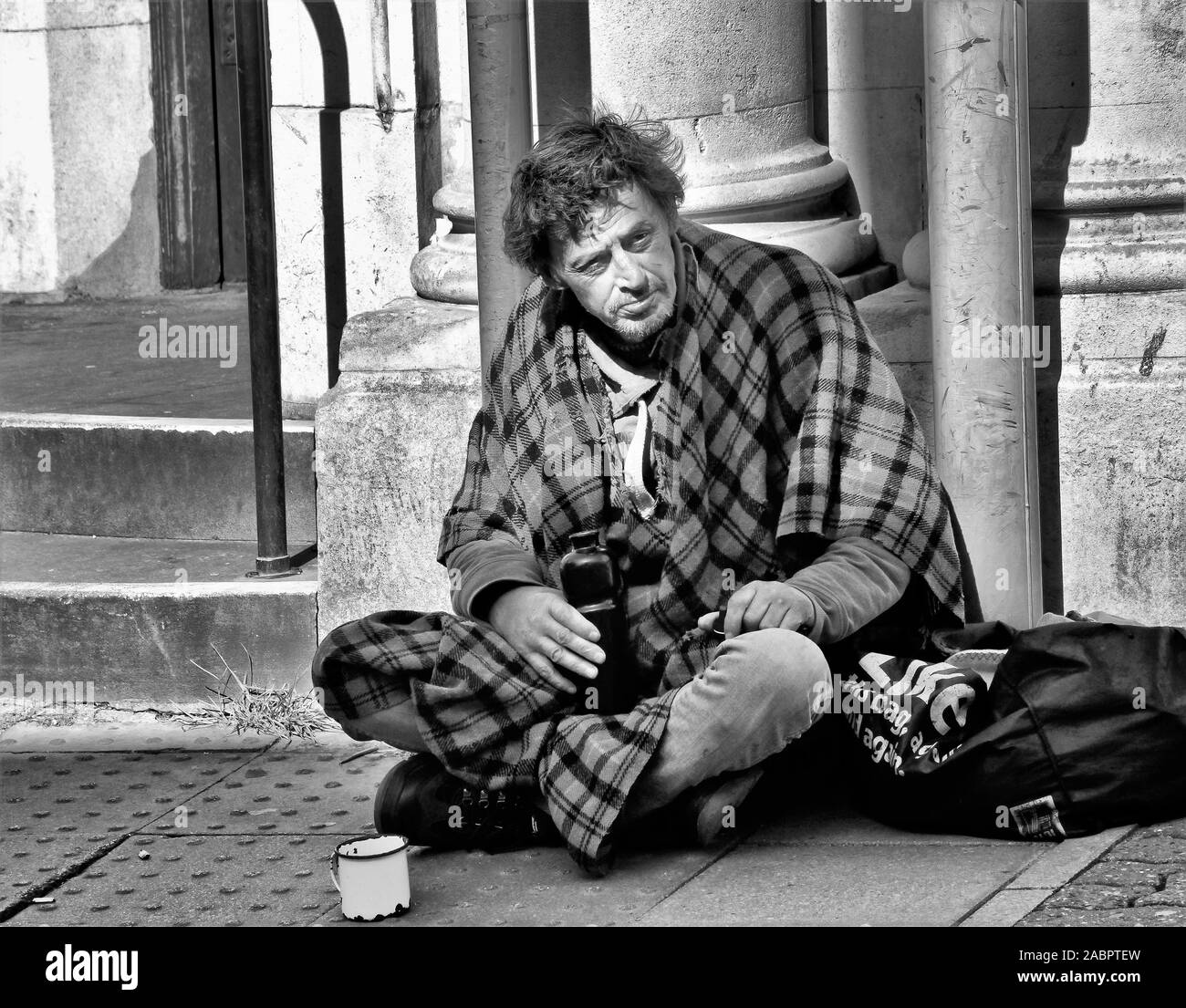 An handicapped man begging Black and White Stock Photos & Images - Alamy