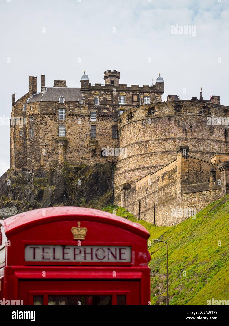 English phone booth on edinburgh castle background Stock Photo - Alamy