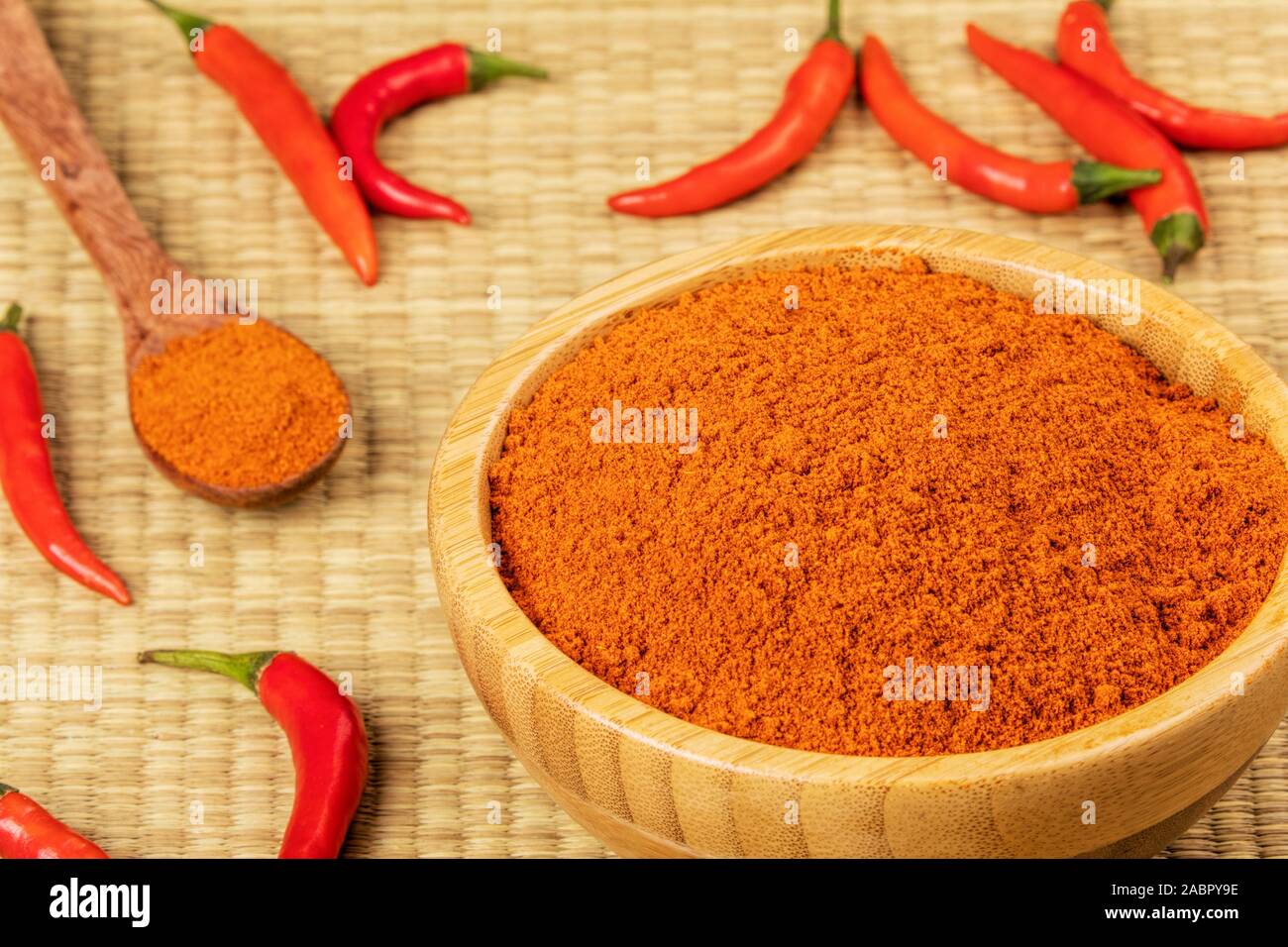 Bowl full of Chili Powder on a bamboo background Stock Photo - Alamy