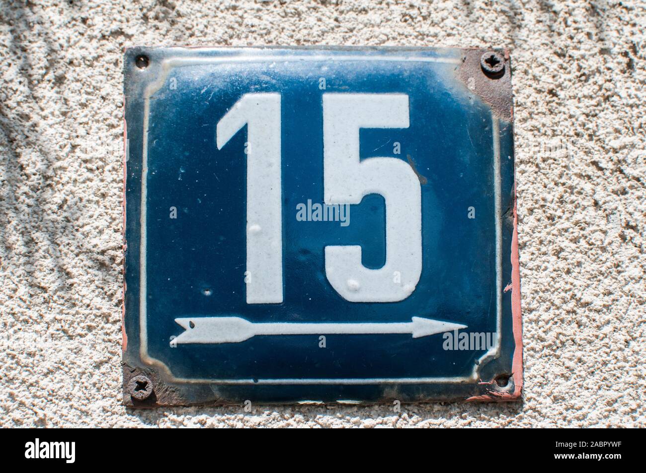 Weathered grunge square metal enameled plate of number of street ...