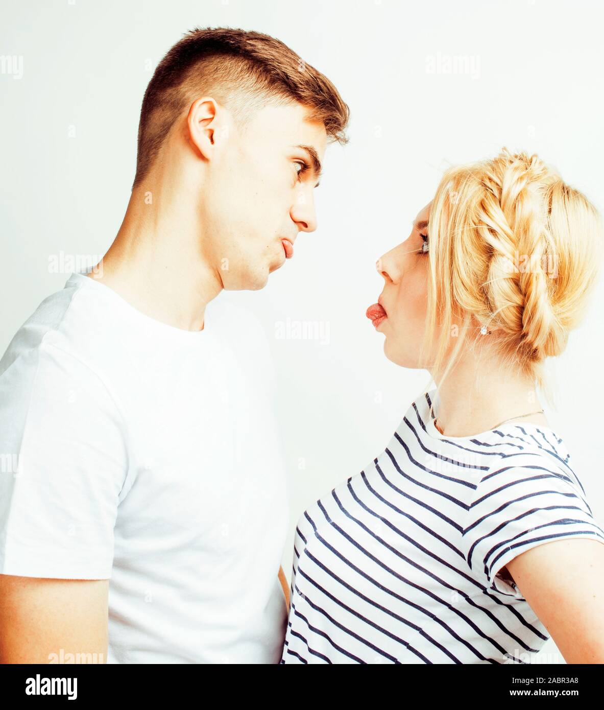 young pretty teenage couple, hipster guy with his girlfriend happy ...