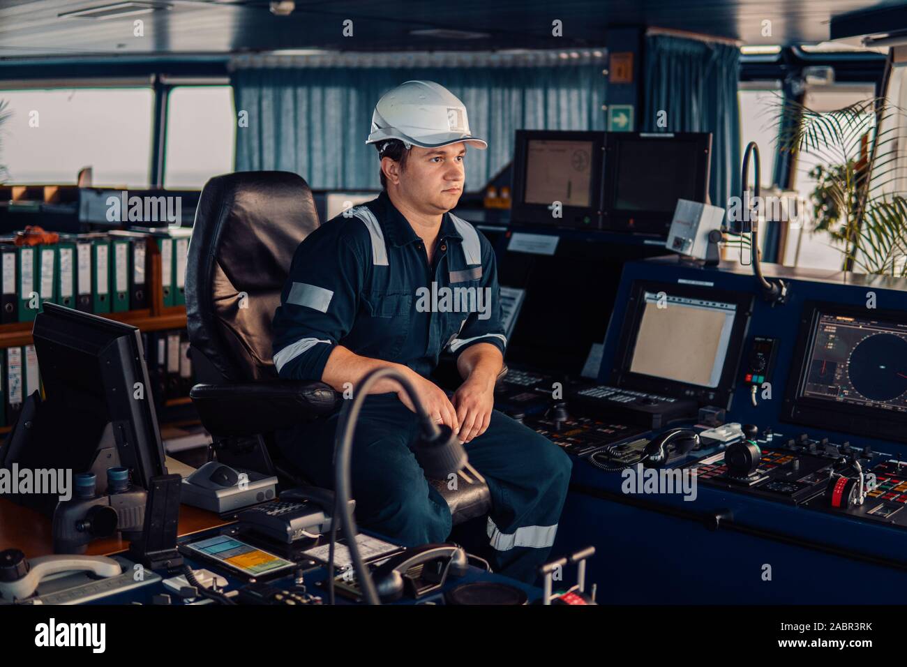 Marine navigational officer during navigational watch on Bridge . Work ...