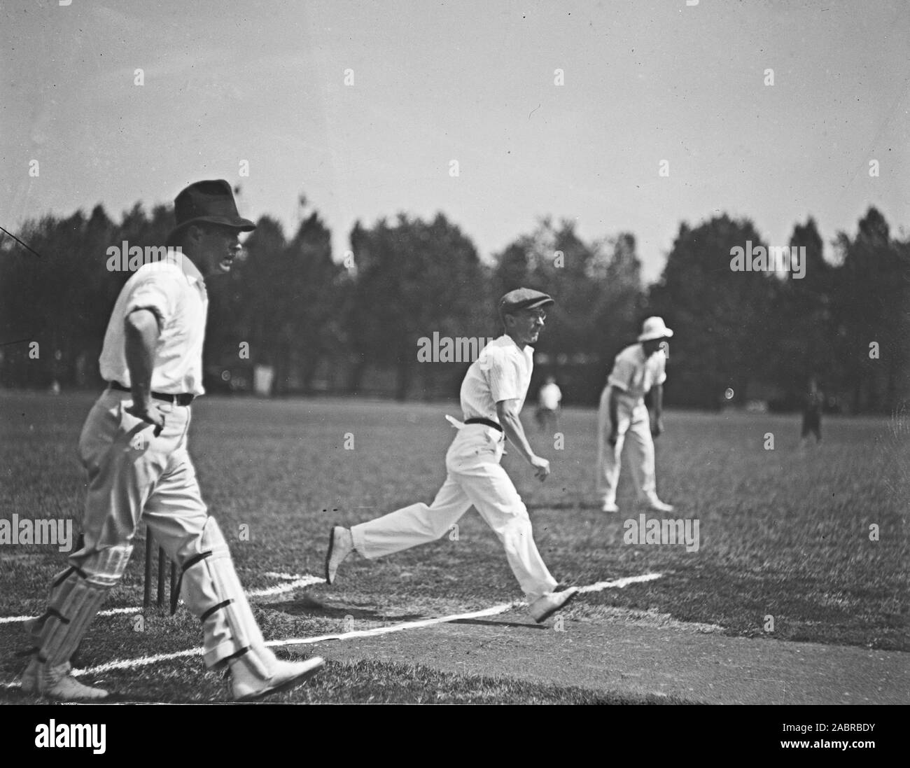 Cricket players playing a game of cricket ca. 1920 or 1921 Stock Photo ...
